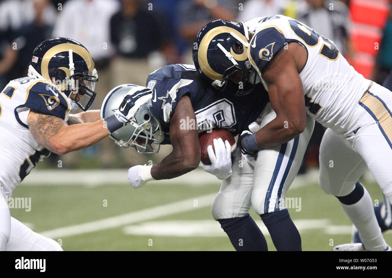 Dallas Cowboys DeMarco Murray is stopped by St. Louis Rams James ...