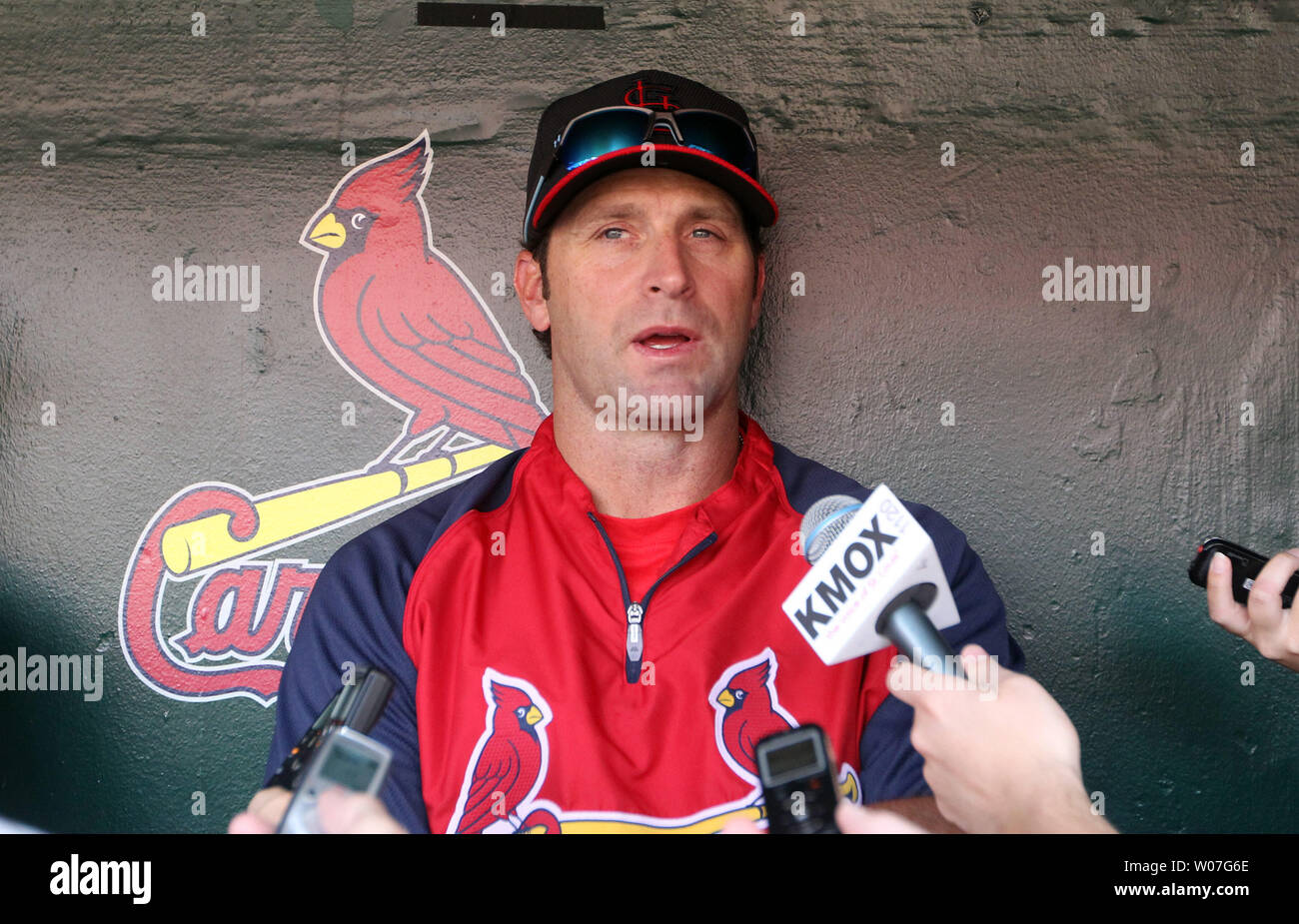 St. Louis Cardinals manager Mike Matheny talks to reporters during a ...