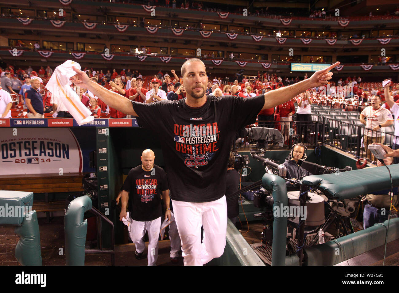 St. Louis Cardinals pitcher Adam Wainwright pumps up the fans that are ...