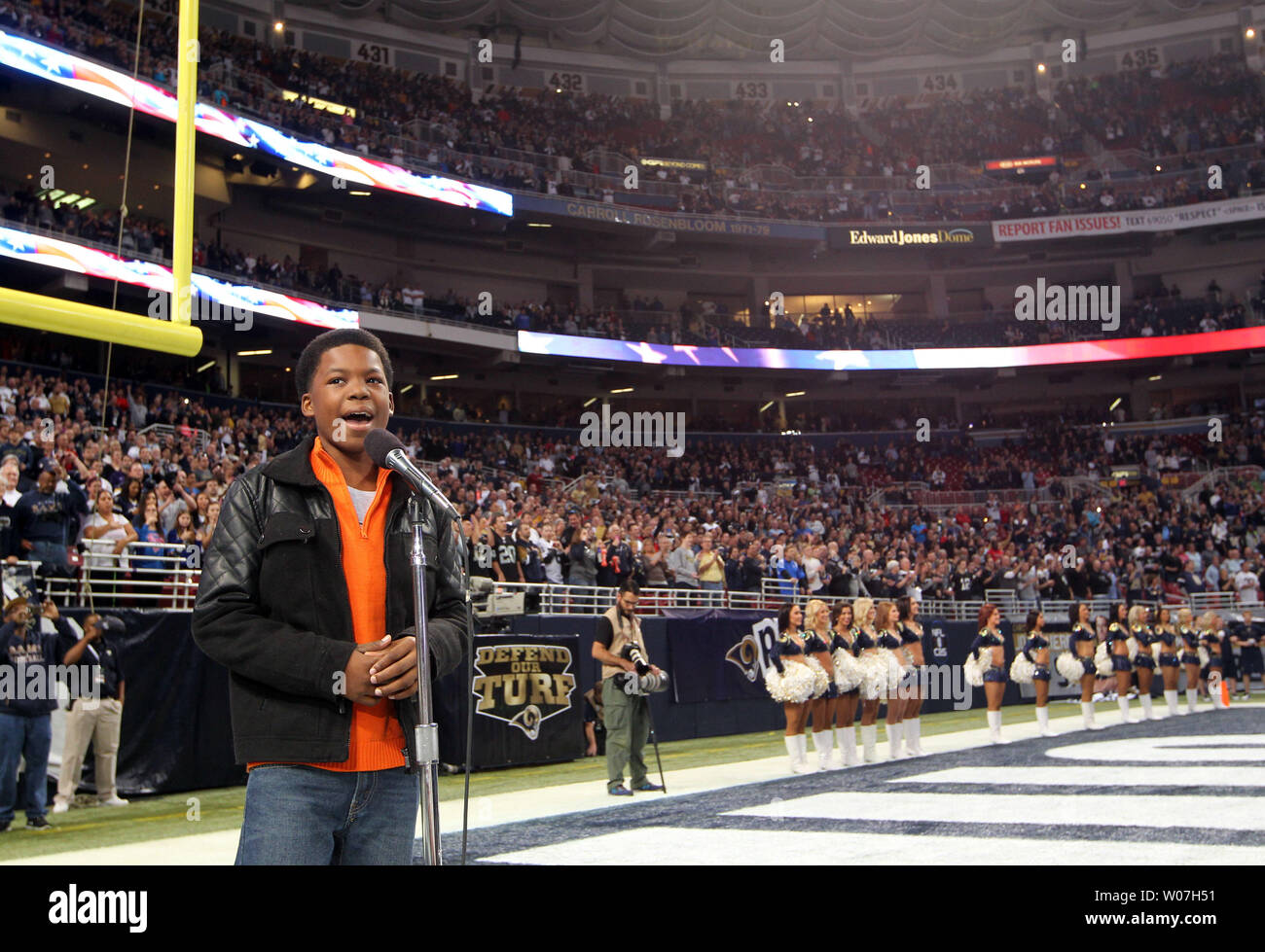 Twelve year old Ralph Beck sings the National Anthem before the Oakland ...