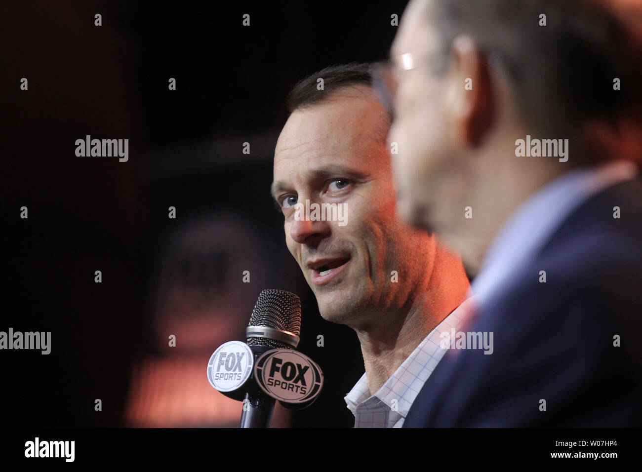 St. Louis Cardinals President Bill DeWitt III talks to the crowd as his ...