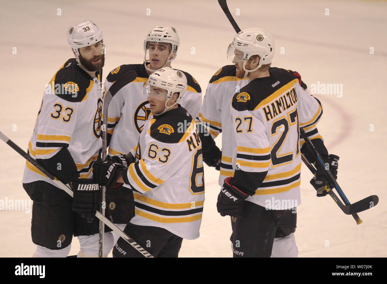 Boston Bruins Brad Marchand (63) celebrates his first period goal ...