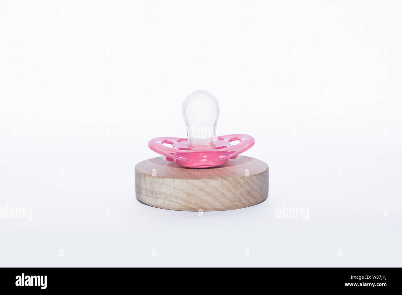 Baby pacifier on white background Stock Photo - Alamy