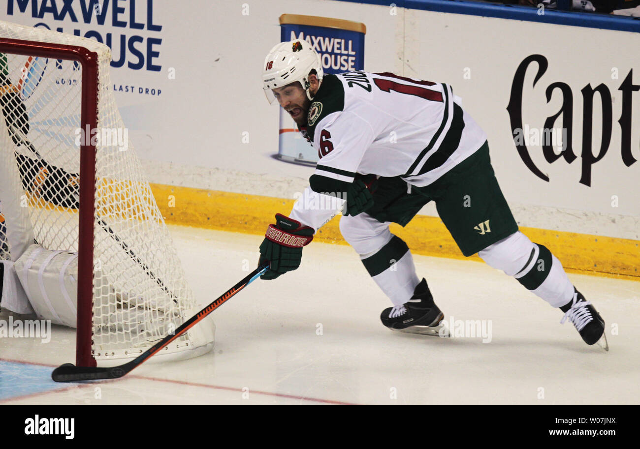 Minnesota Wild Jason Zucker wraps around the goal putting the puck in ...