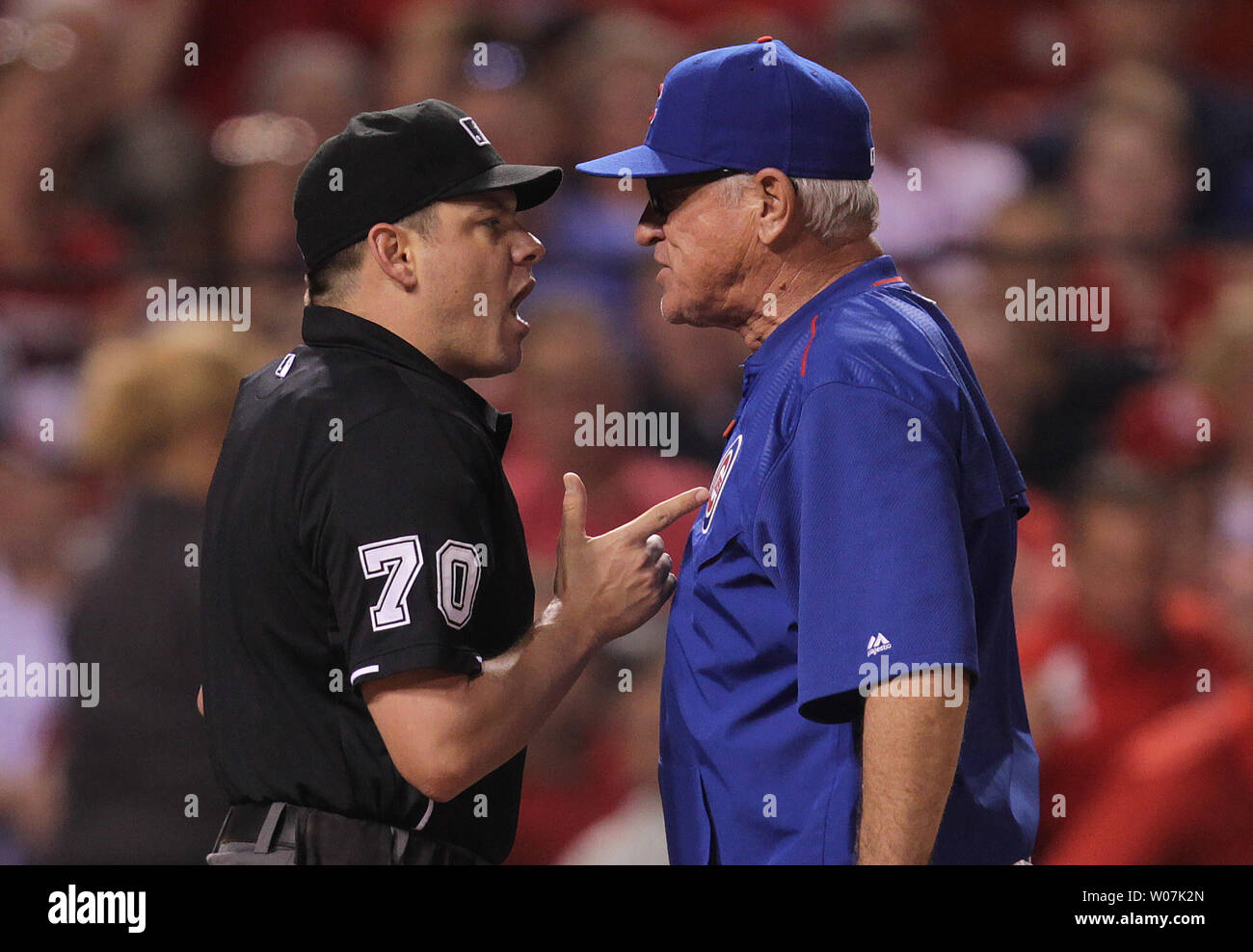 Home plate umpire D.J. Reyburn answers questions by Chicago Cubs ...