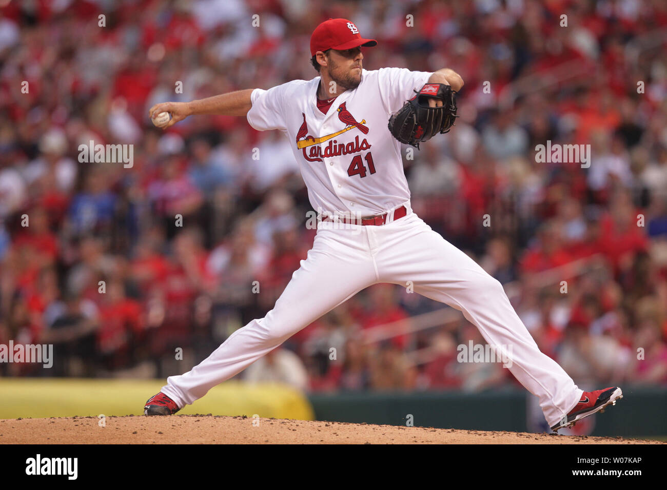 St. Louis Cardinals starting pitcher John Lackey delivers a pitch to ...