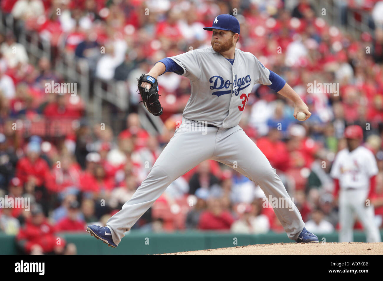 Los Angeles Dodgers starting pitcher Brett Anderson delivers a pitch to ...