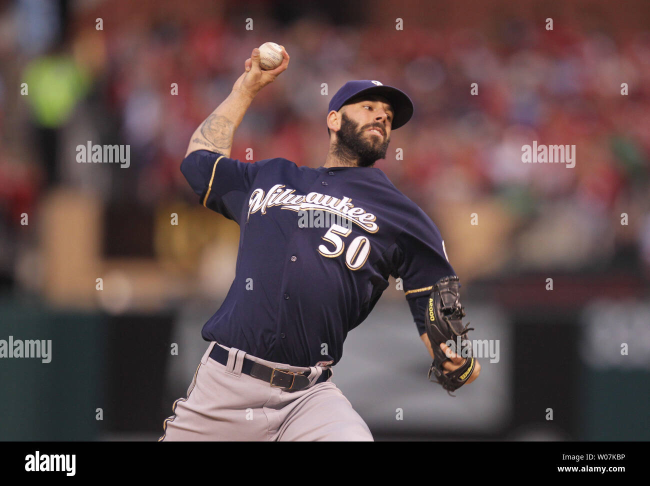 Milwaukee Brewers starting pitcher Mike Fiers delivers a pitch to the ...