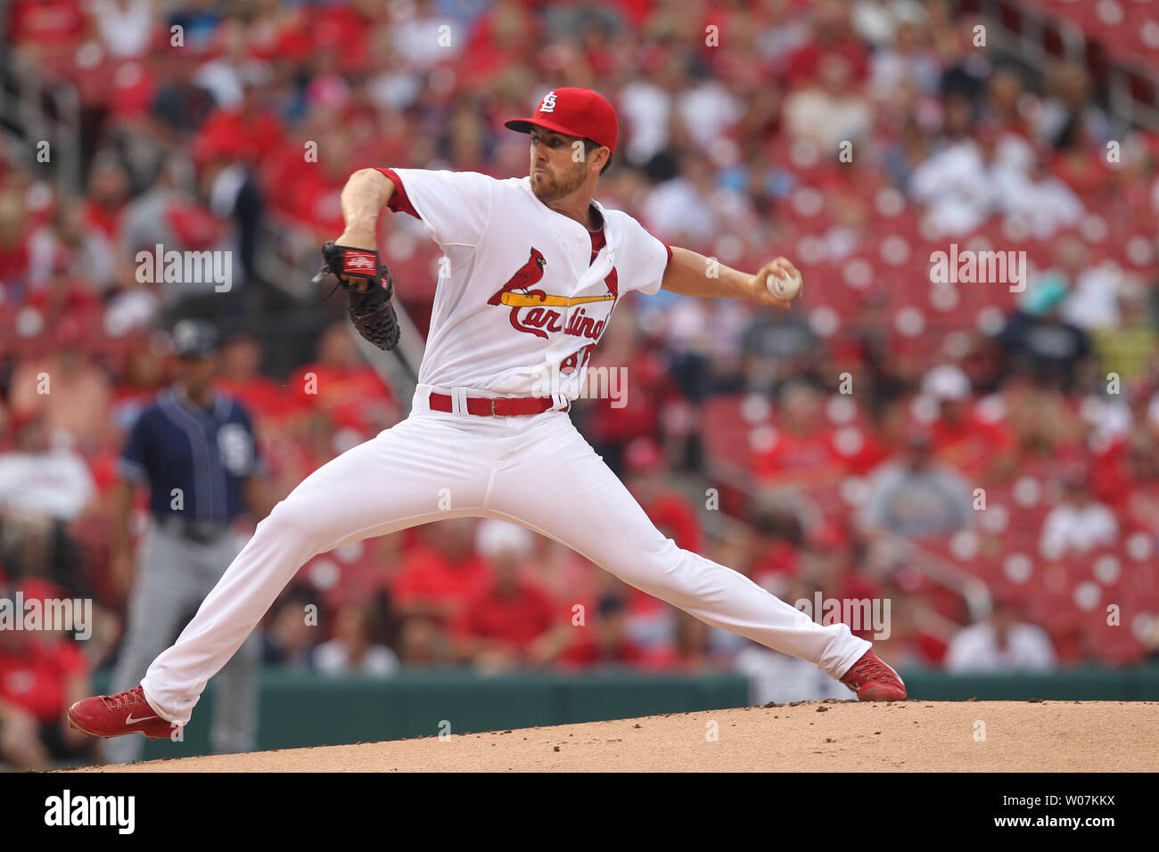 St. Louis Cardinals starting pitcher Tim Cooney delivers a pitch to the ...