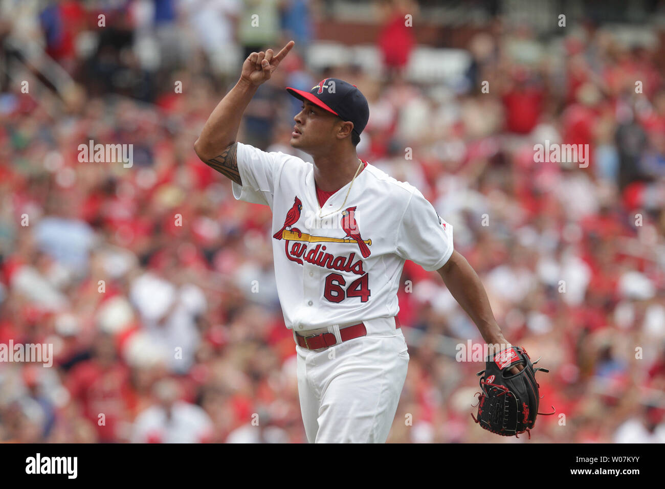 St. Louis Cardinals pitcher Sam Tuivailala points skyward after ...
