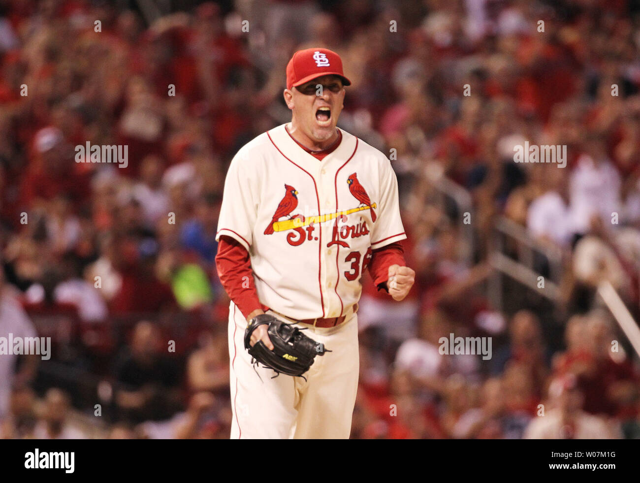 St. Louis Cardinals pitcher Randy Choate pumps his fist after a doube ...