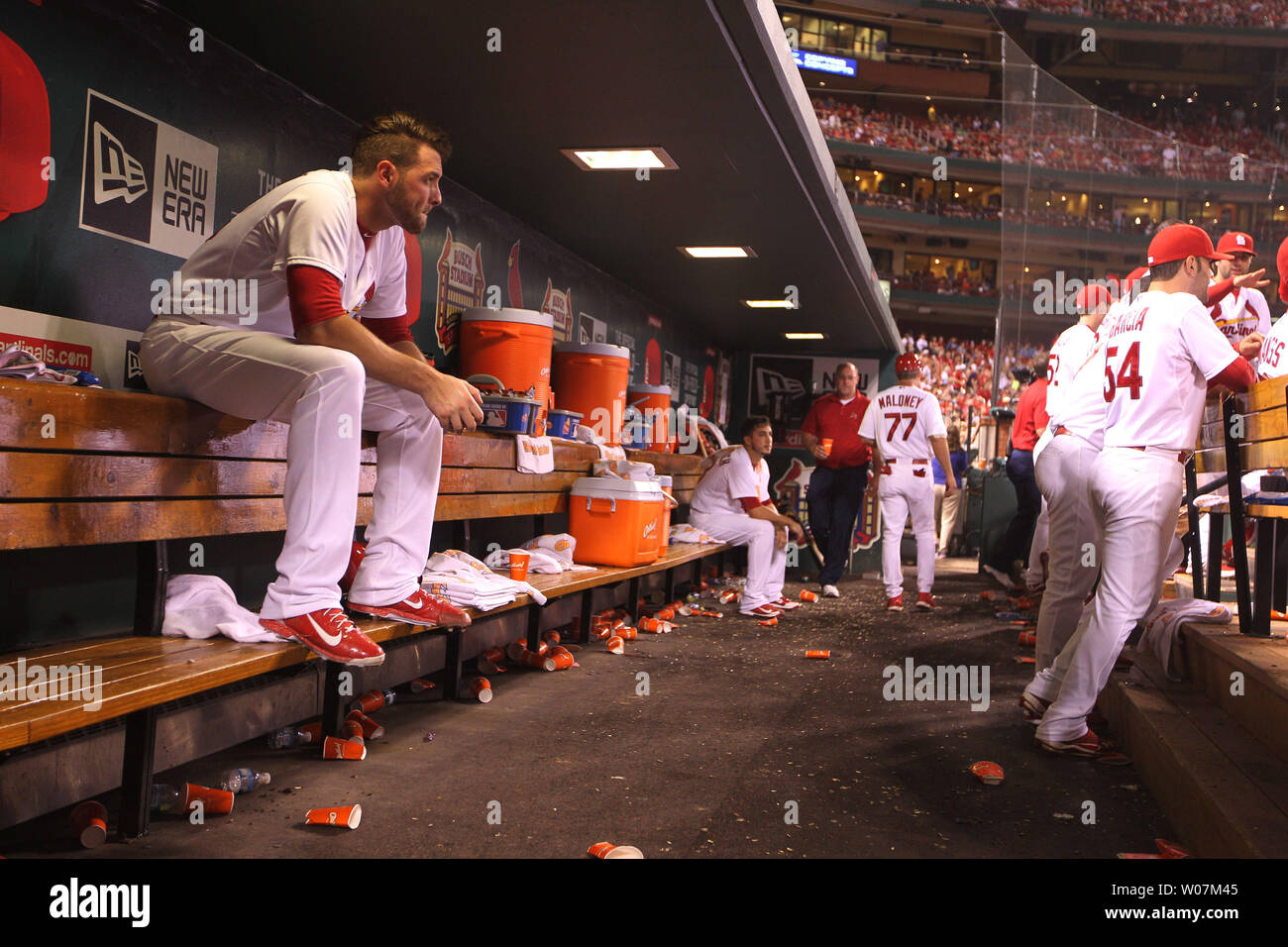 St. Louis Cardinals pitcher Kevin Siegrist sits alone in the dugout ...