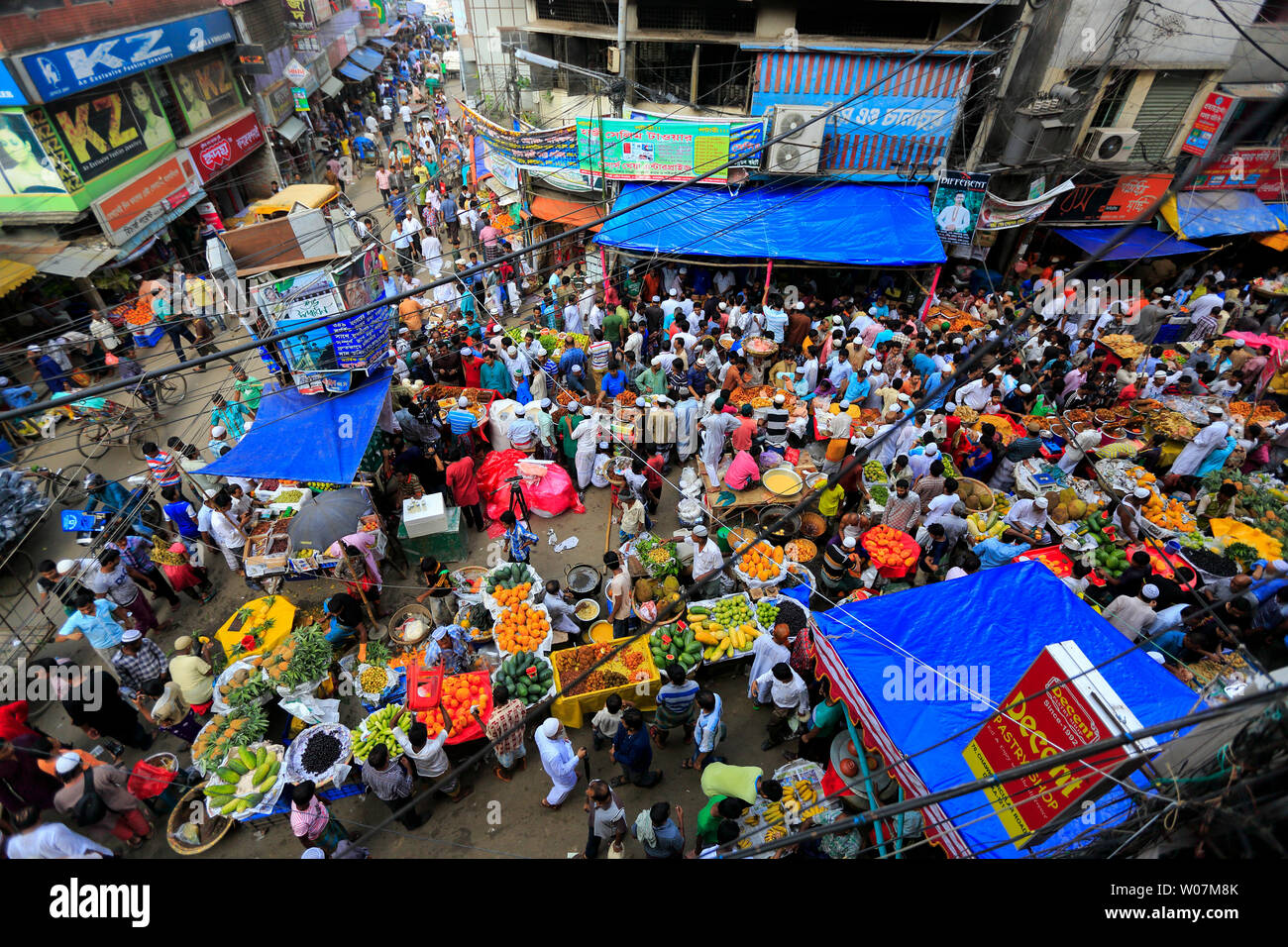 Chawk Bazar iftar market of Dhaka is well known for traditional spicy foods. Thousands of people ...