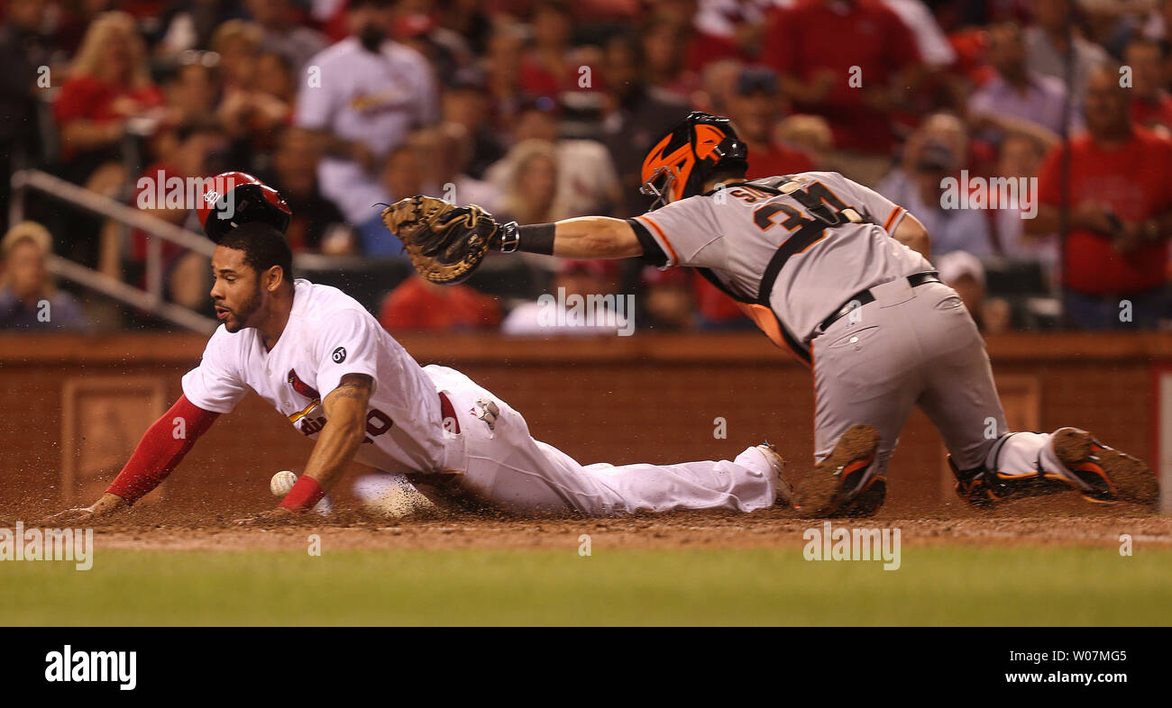 San Francisco Giants catcher Andrew Susac drops the baseball as St ...