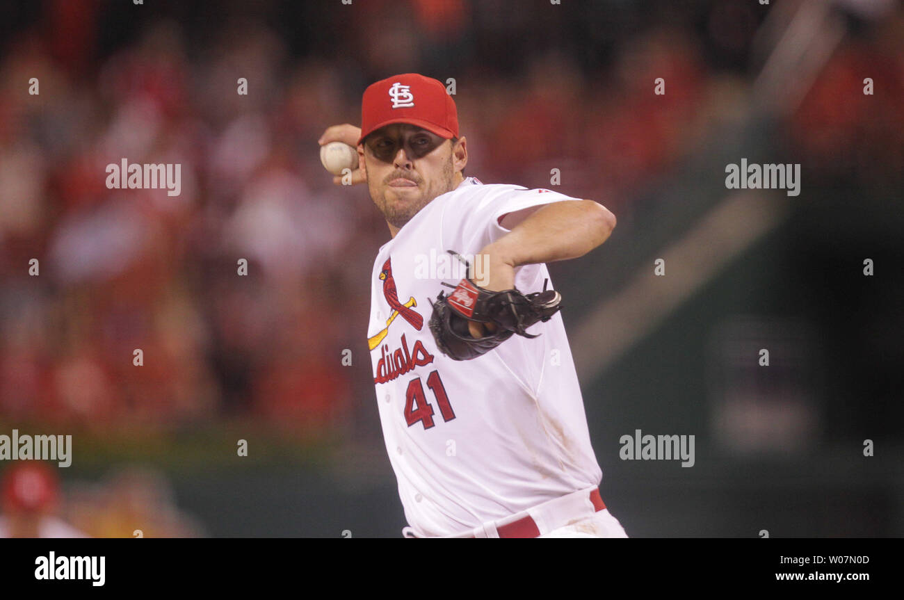 St. Louis Cardinals starting pitcher John Lackey delivers a pitch to ...
