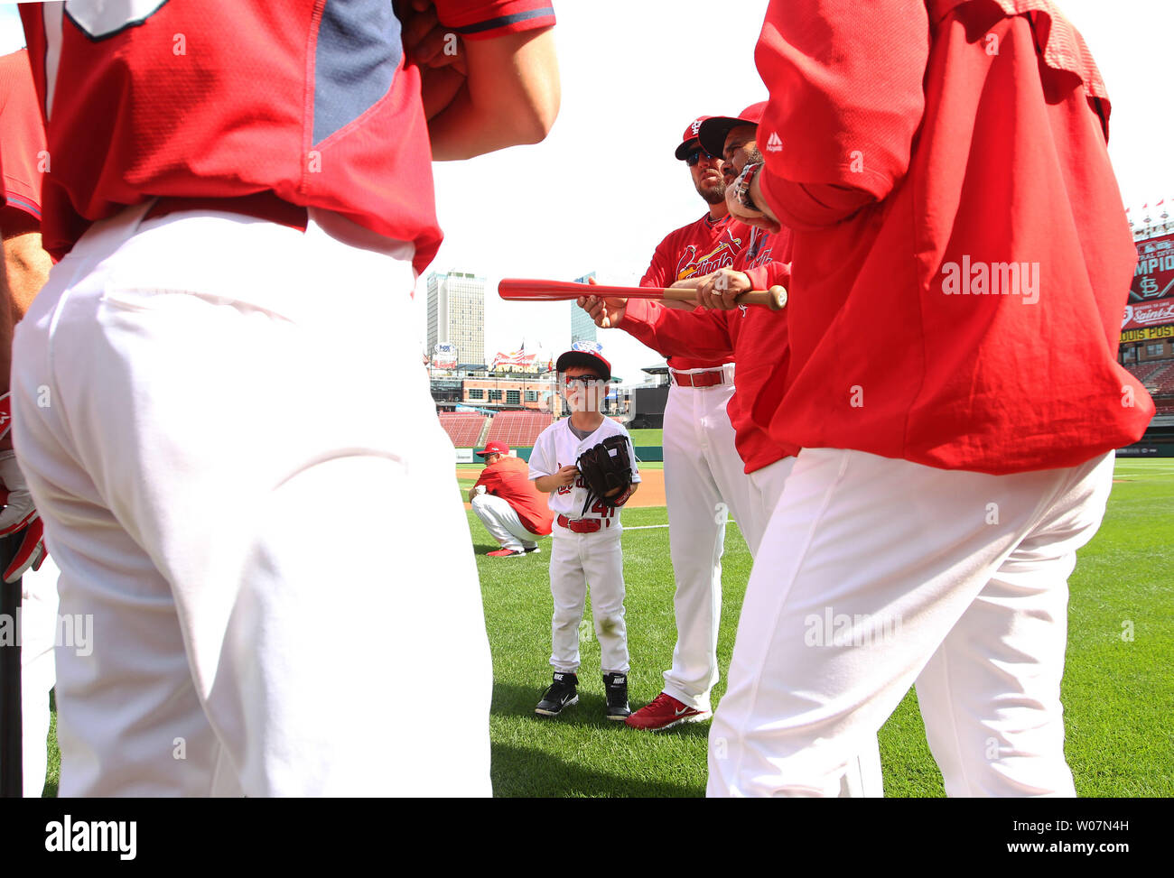 Six-year-old Carter Lackey stands with his father, St. Louis Cardinals ...