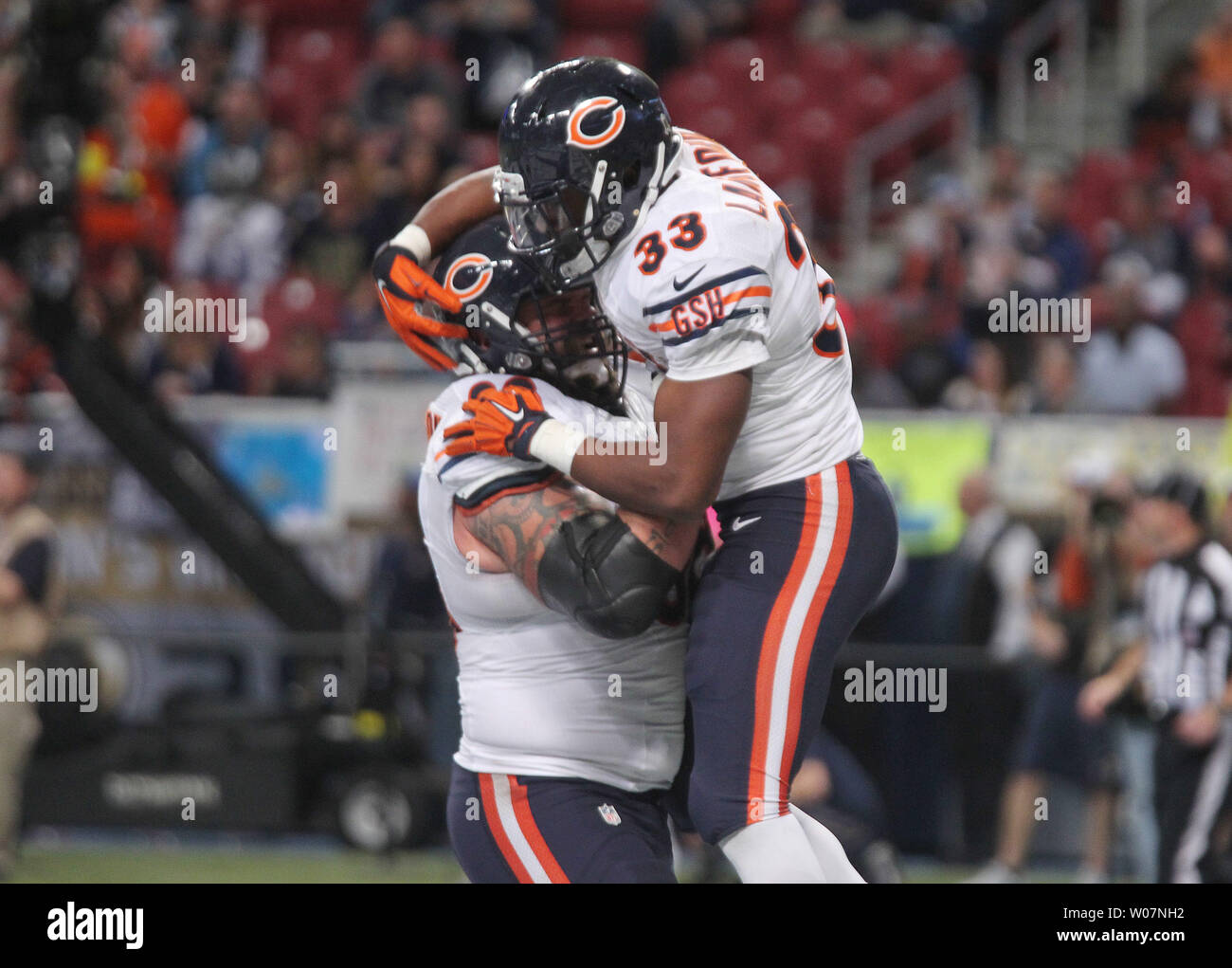 Chicago Bears Jeremy Langford jumps into the arms of teammate Matt ...