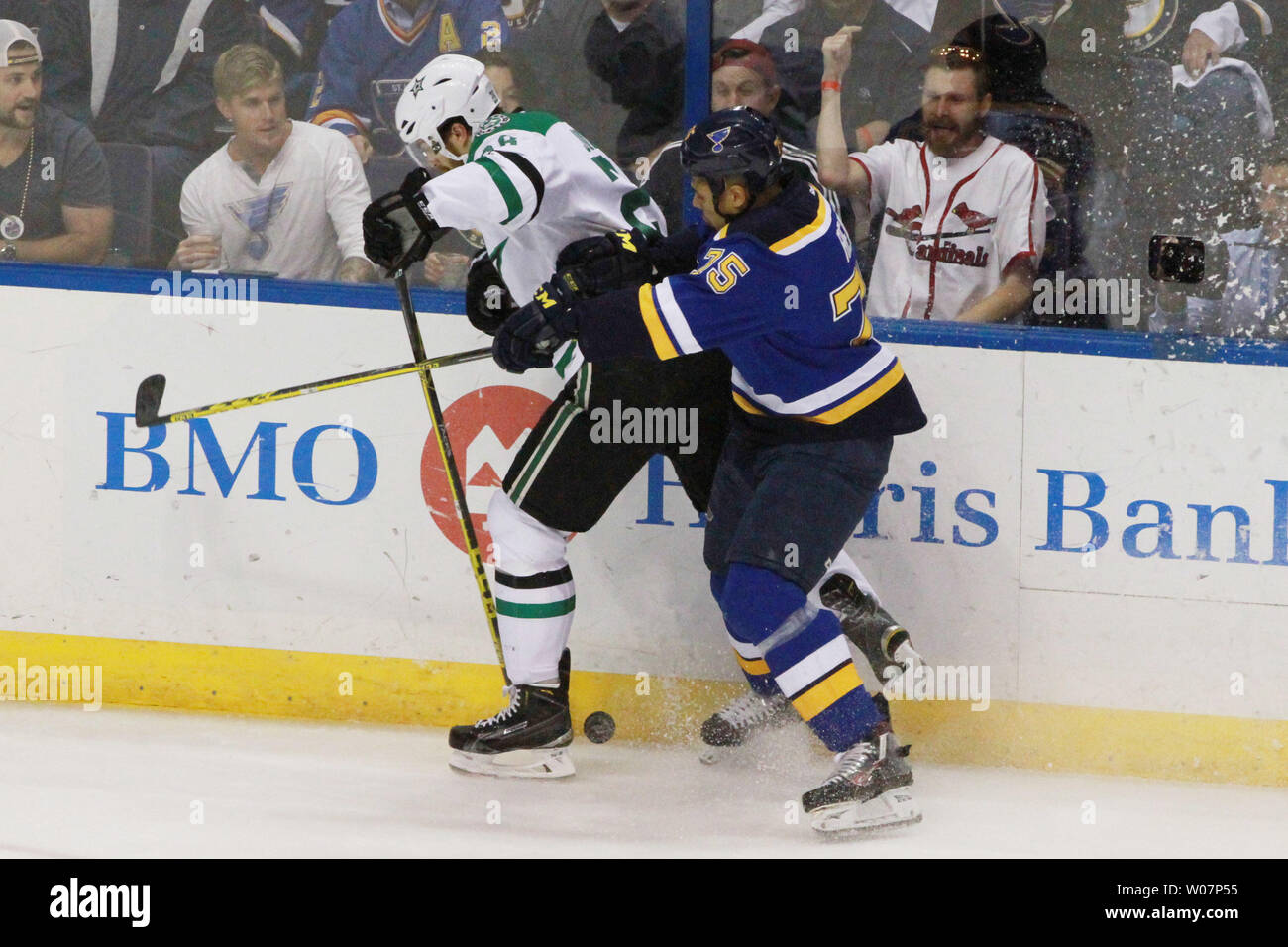 St. Louis Blues Ryan Reaves checks Dallas Stars Stephen Johns in the ...