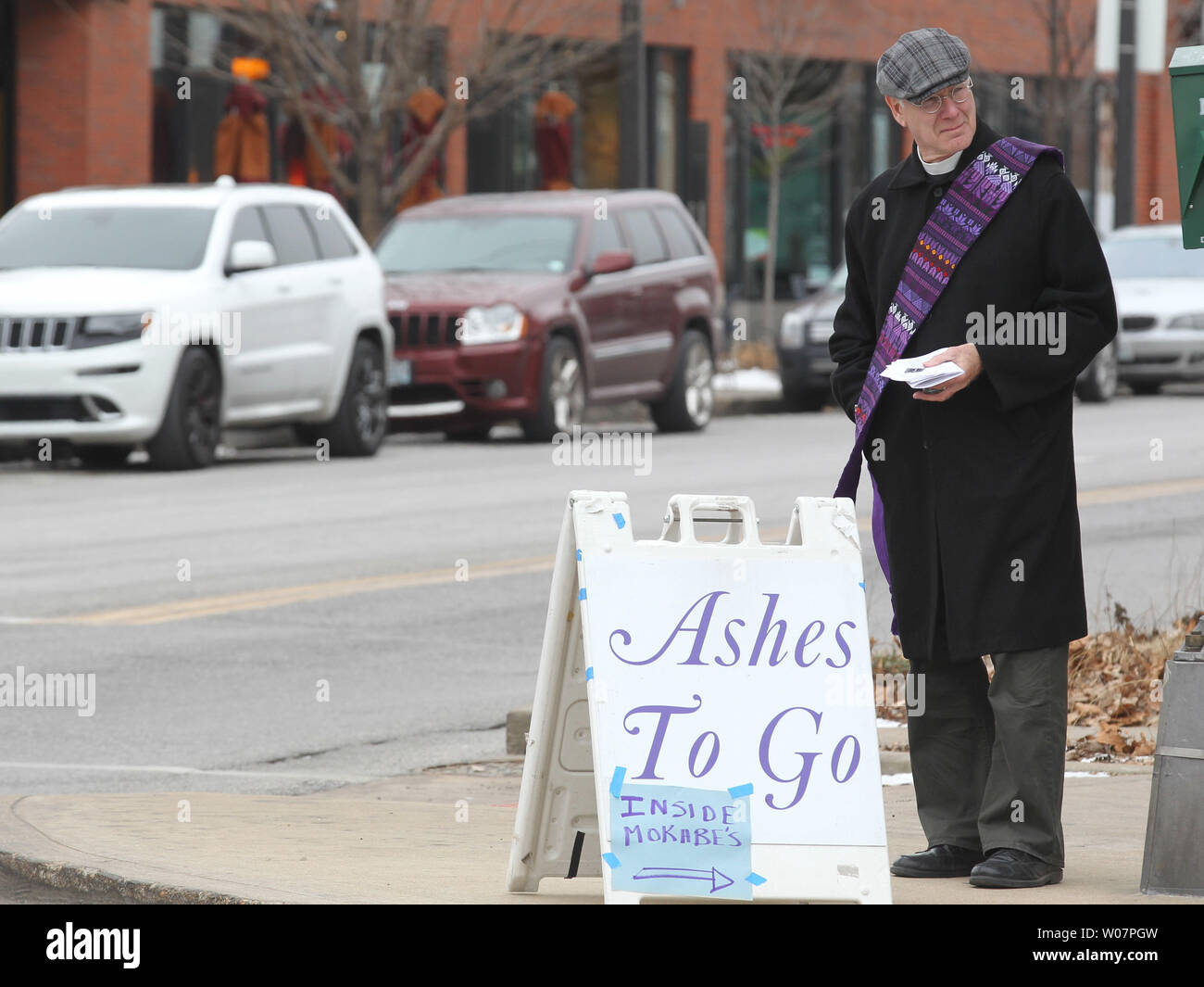 The Rev. Kevin McGrane looks for interested people to partake in a Ash ...