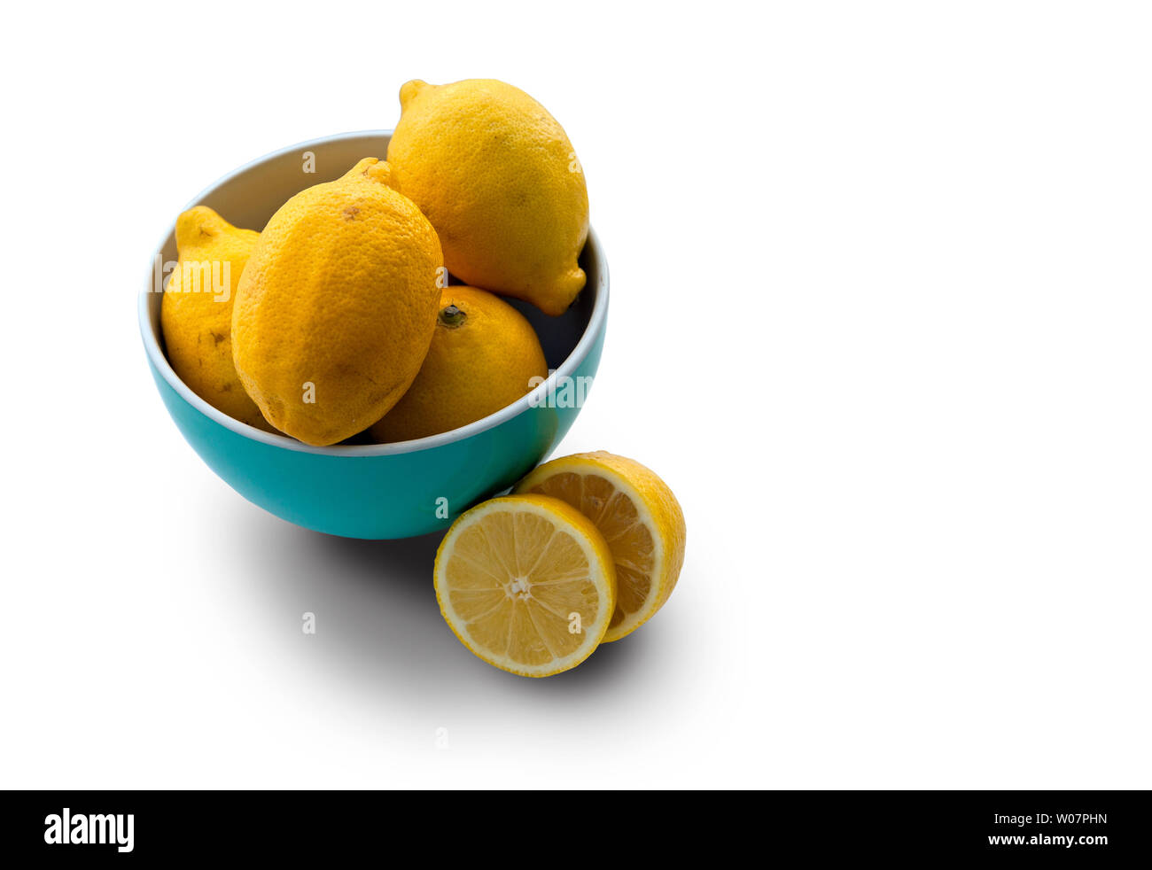 Lemon juice in bowl Cut Out Stock Images & Pictures - Alamy
