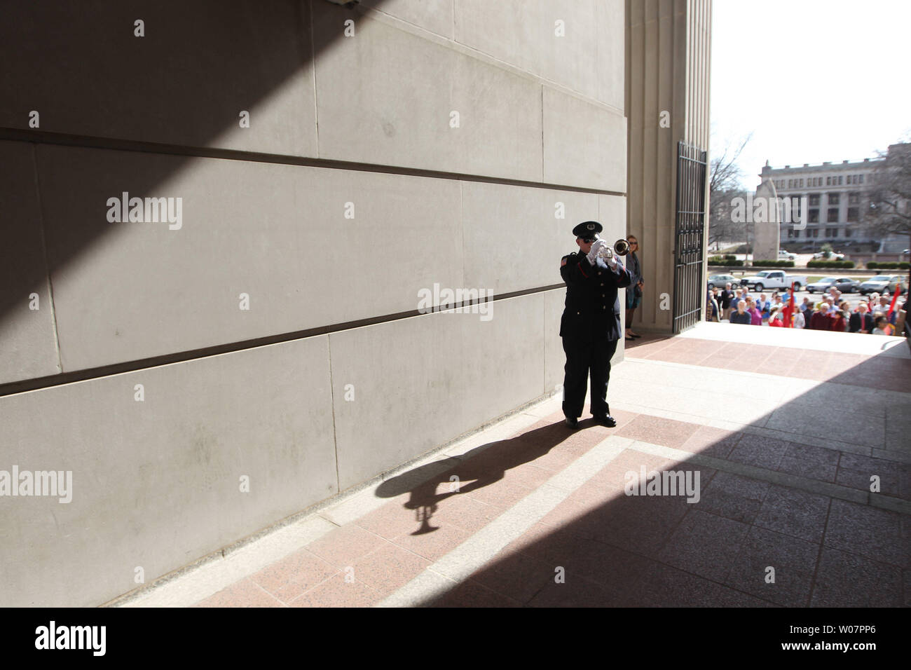 Bugler Sarah Gamblin-Luig plays taps during closing ceremonies of the ...