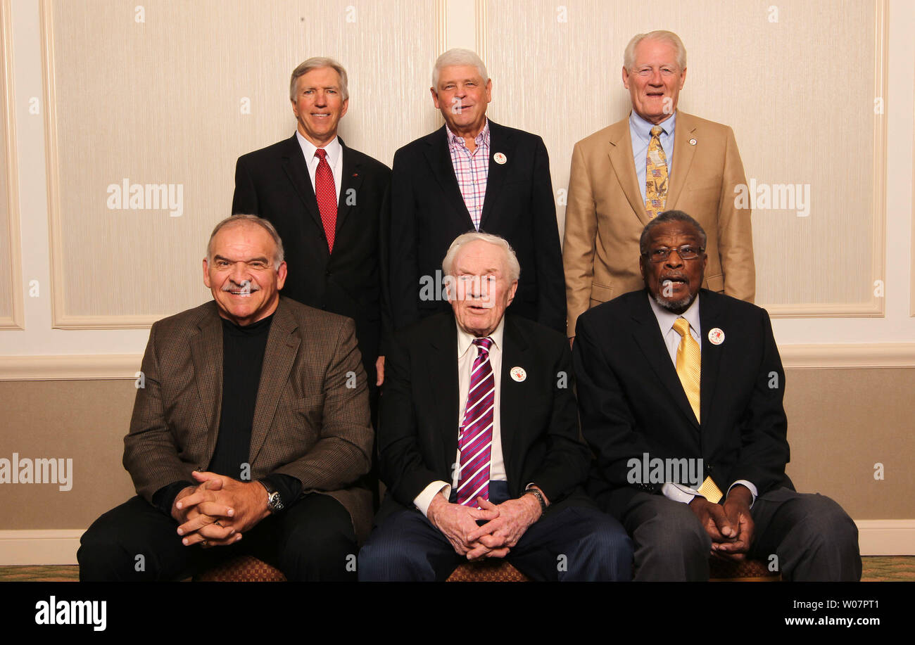 Former St. Louis Football Cardinal players (front L to R) Dan Dierdorf ...