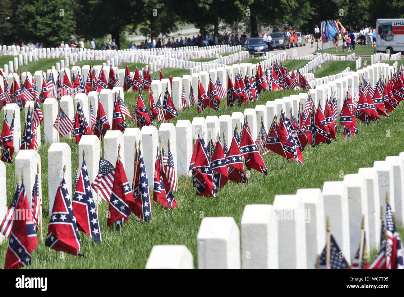 Confederate flags line grave sites in the Confederate section of ...
