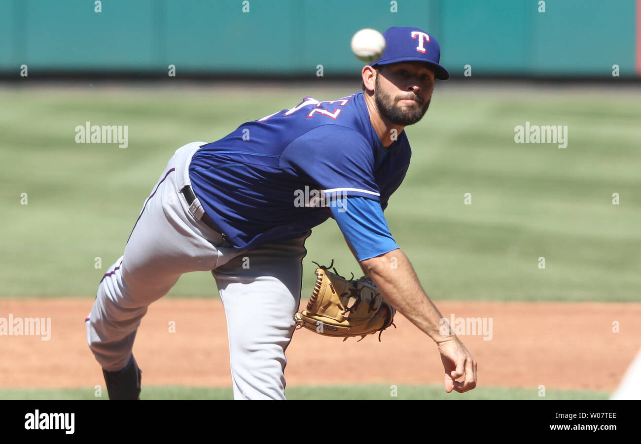 Texas Rangers starting pitcher Nick Martinez delivers a pitch to the St ...