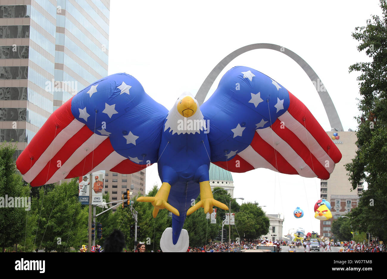 A oversized eagle balloon is carried down Market Street during the V.P ...