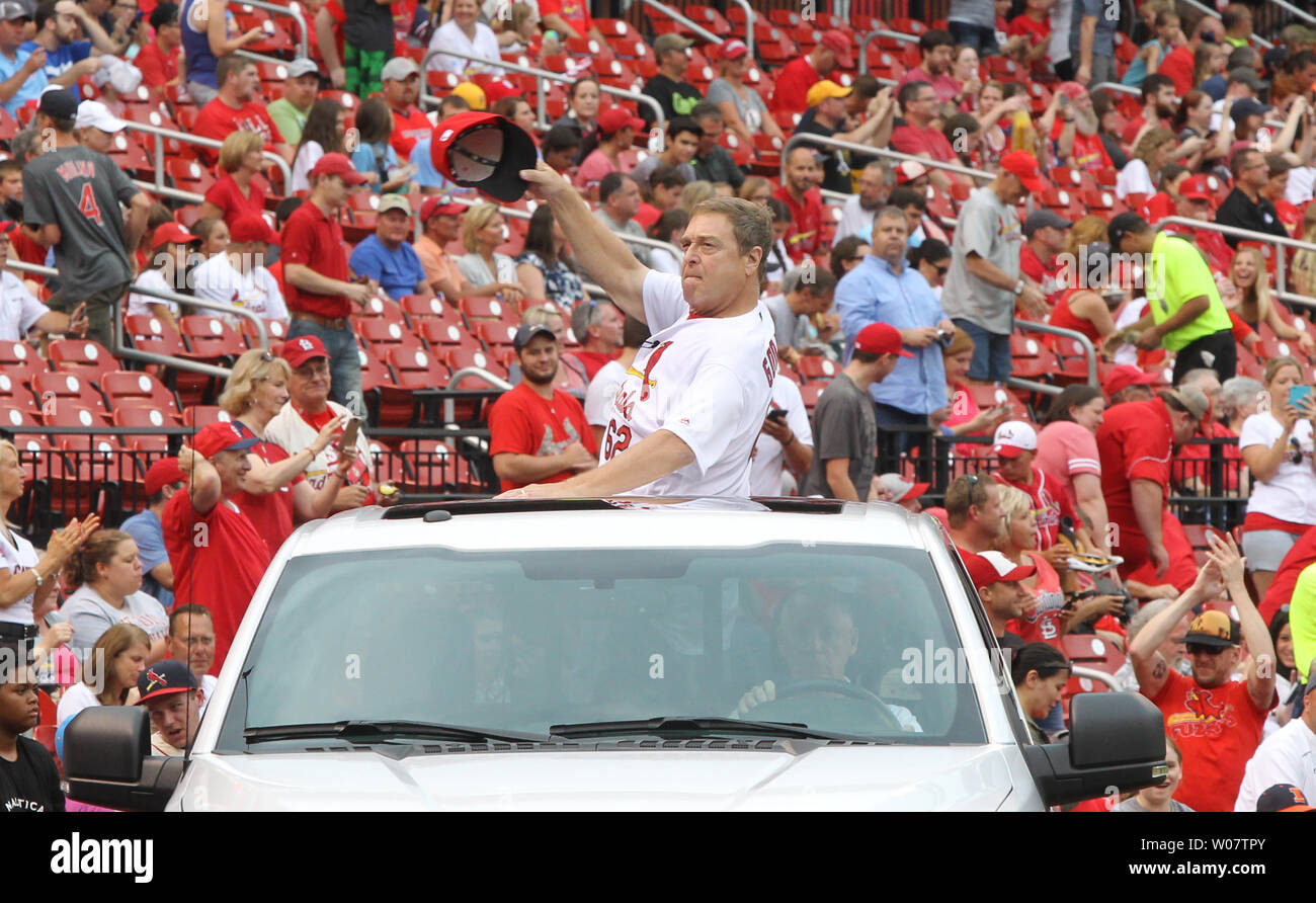 Actor John Goodman waves to the crowd before throwing a ceremonial ...