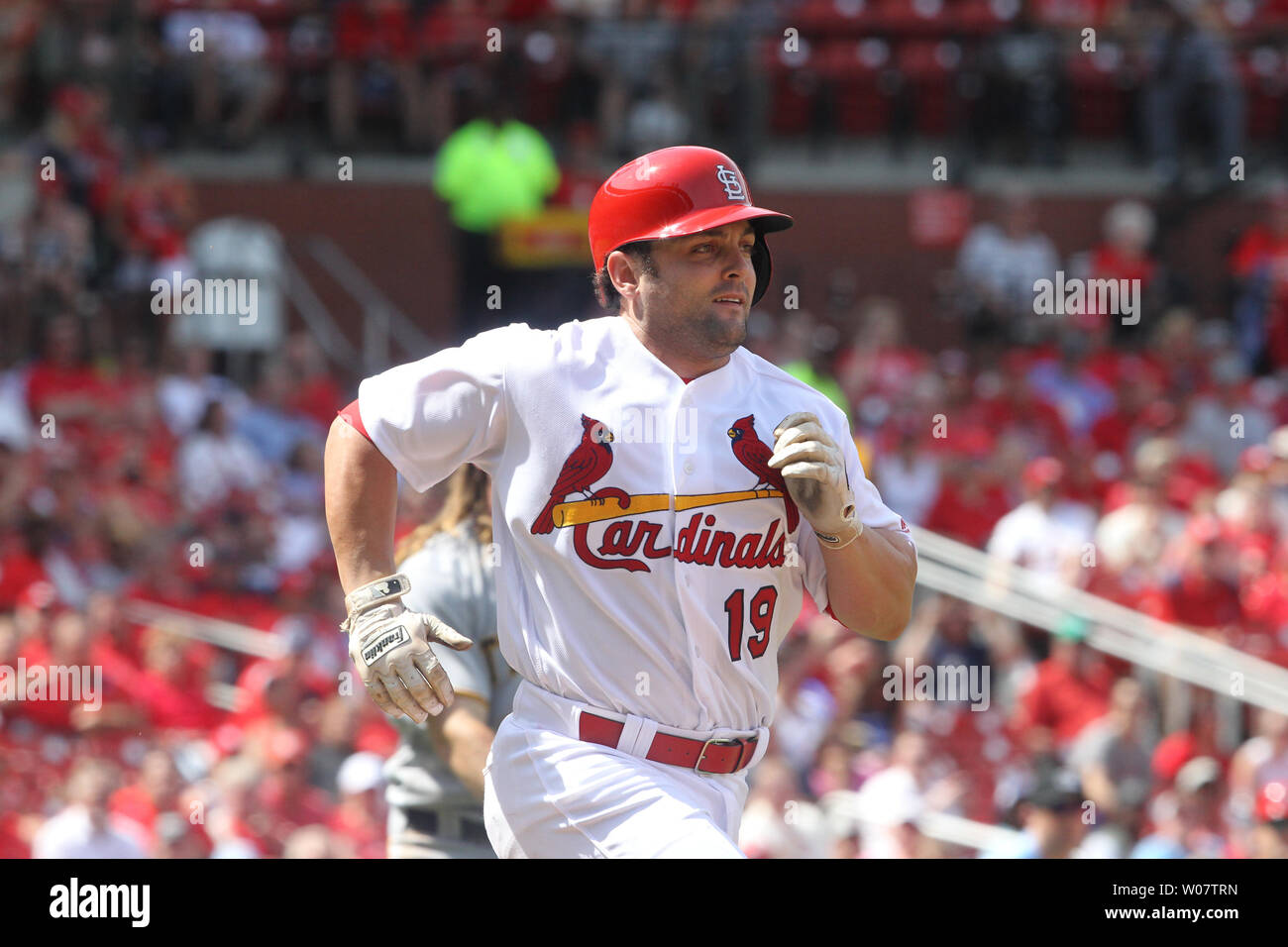New St. Louis Cardinals catcher Michael McKenry runs out a bunt in his ...