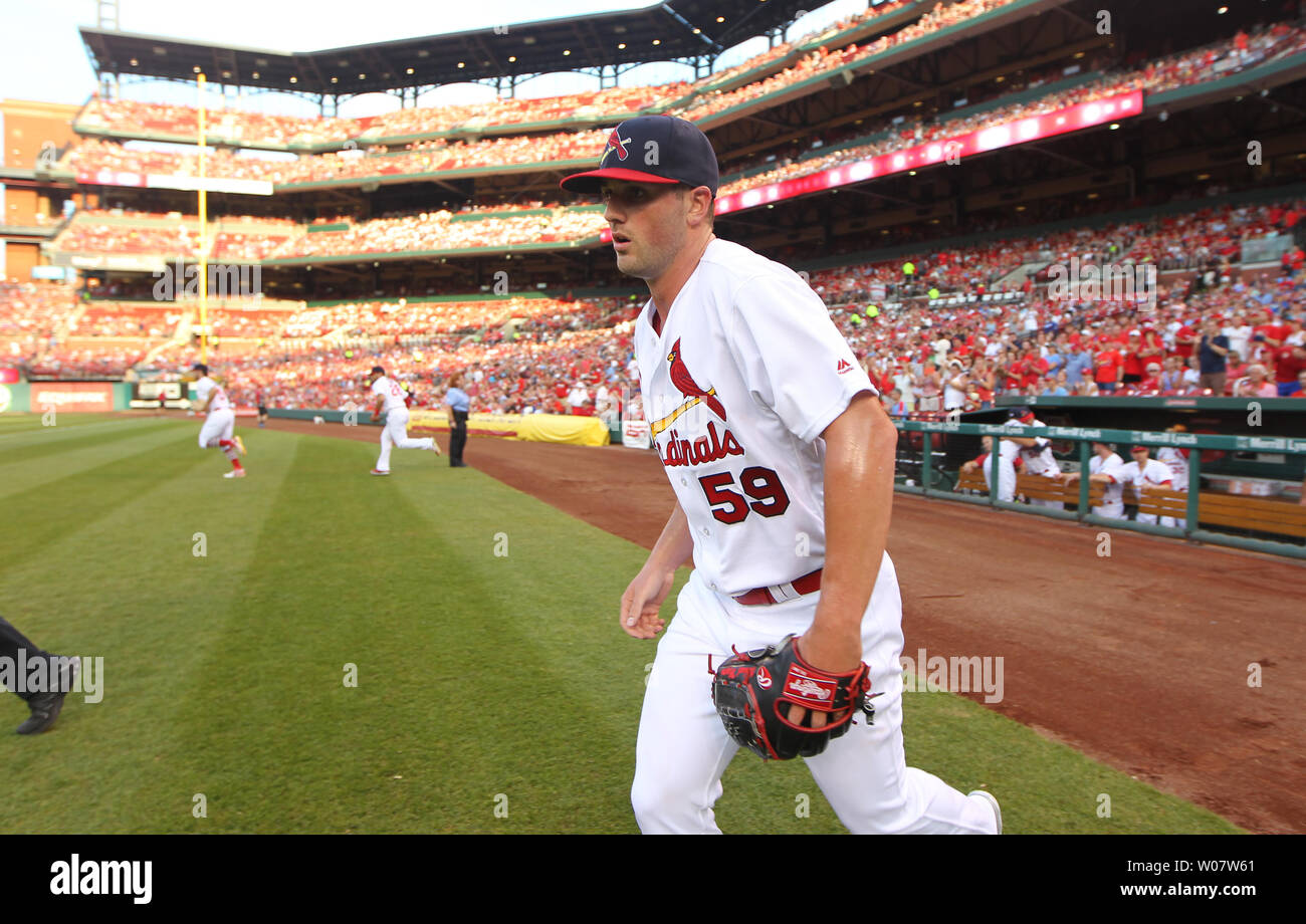 St. Louis Cardinals starting pitcher Mike Mayers takes to the field for ...
