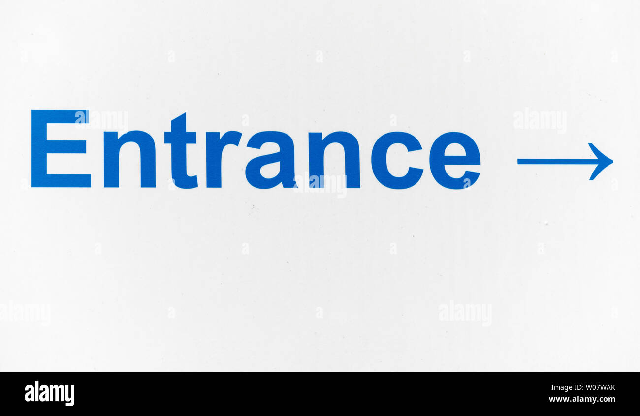 A entrance sign with a arrow pointing the way UK Stock Photo - Alamy