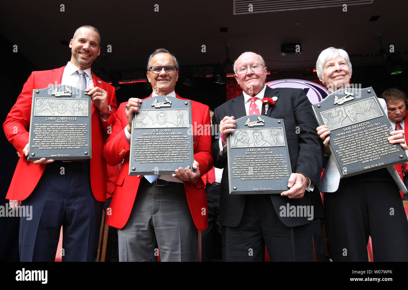 The newest members of the St. Louis Cardinals Hall of Fame pose with ...