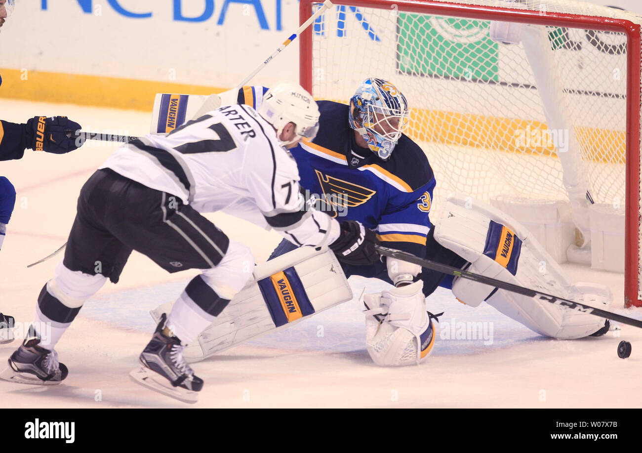 St. Louis Blues goaltender Jake Allen gets a skate on the puck before ...