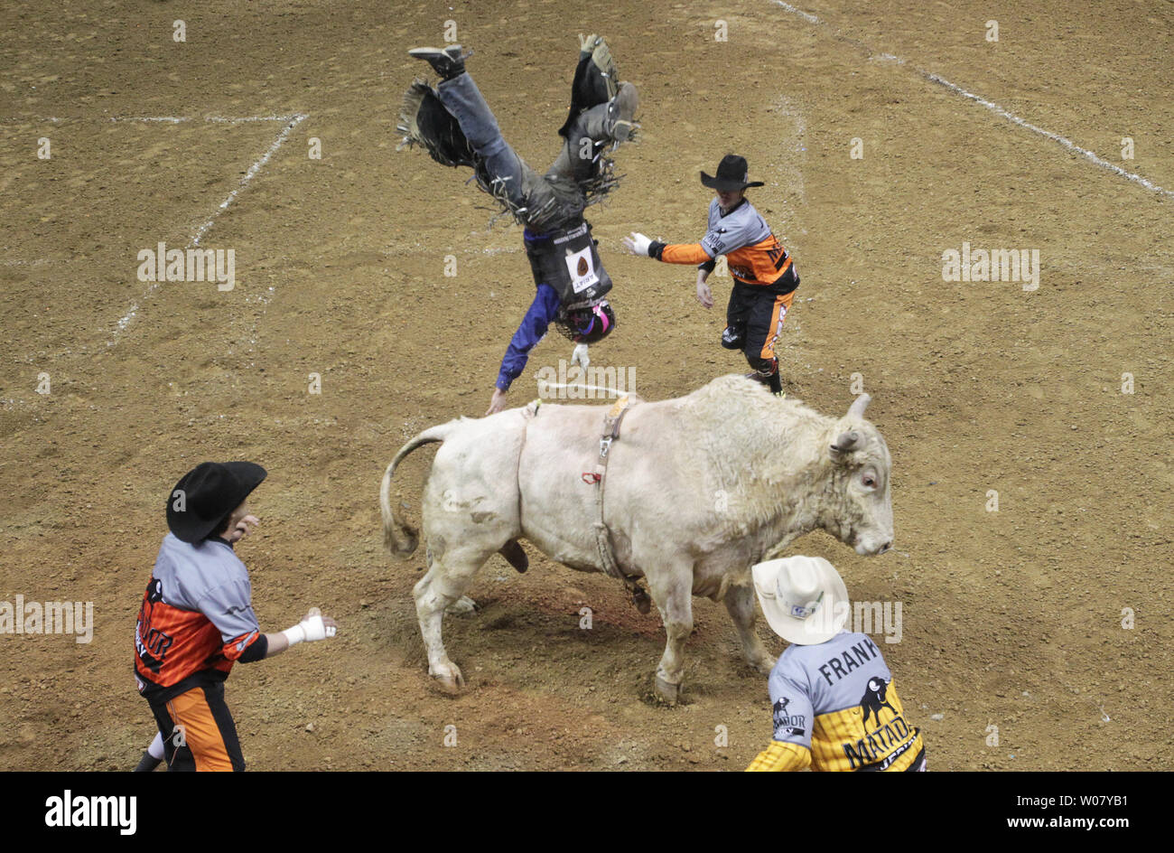 Bull fighters come to the aid of Bullrider Ryan Dirteater of Hulbert ...