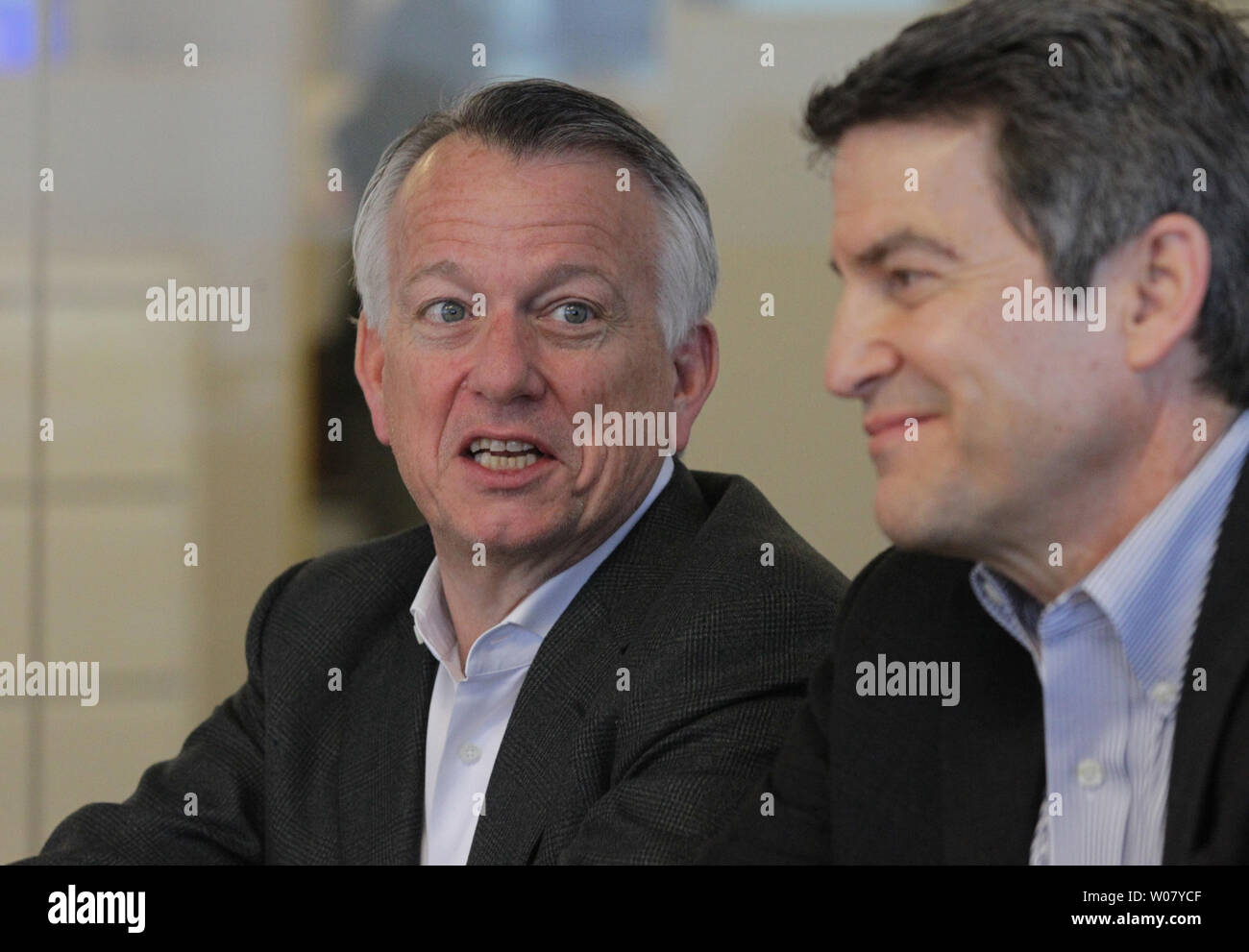 Paul Edgerley (L) and Terry Matlack talk soccer with a newspaper ...
