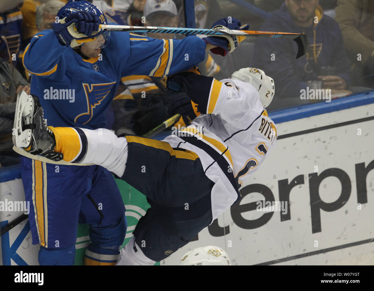 St. Louis Blues Scottie Upshall puts Nashville Predators Anthony ...