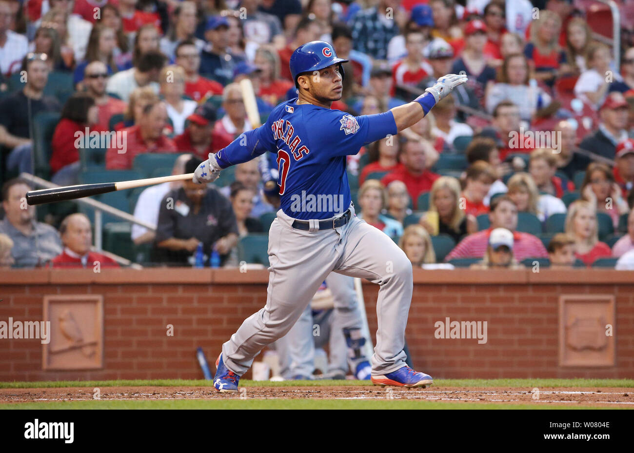 Chicago Cubs Wilson Contreras swings hitting a solo home run in the ...