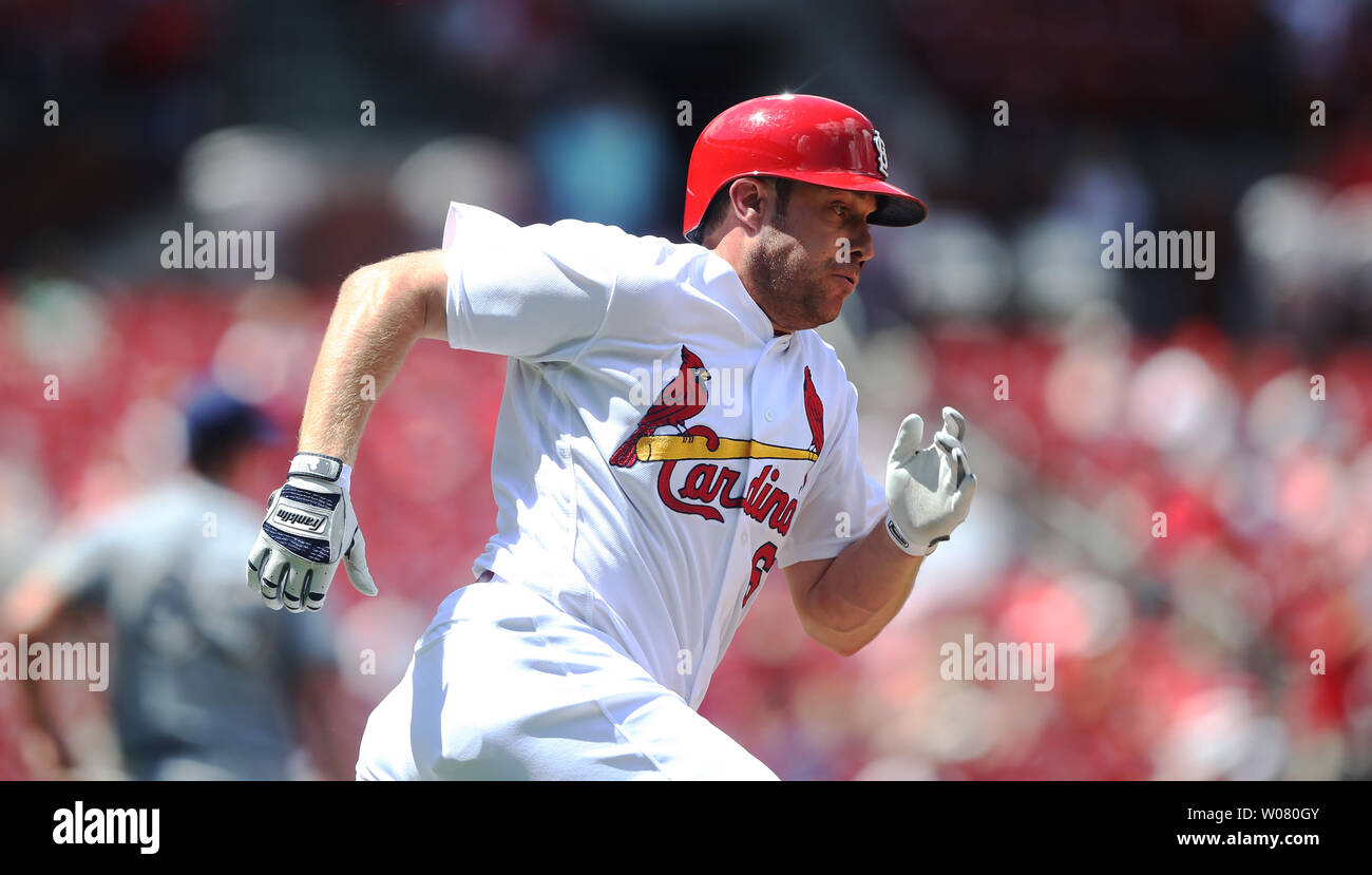 St. Louis Cardinals Chad Huffman runs up the first base line, hitting a ...