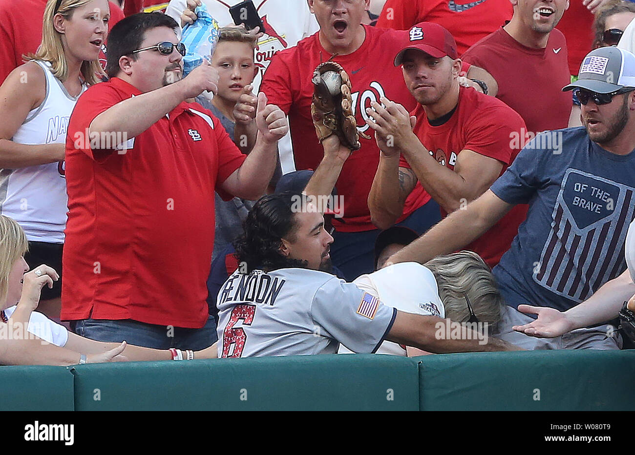 Washington Nationals Anthony Rendon displays the baseball in his glove ...