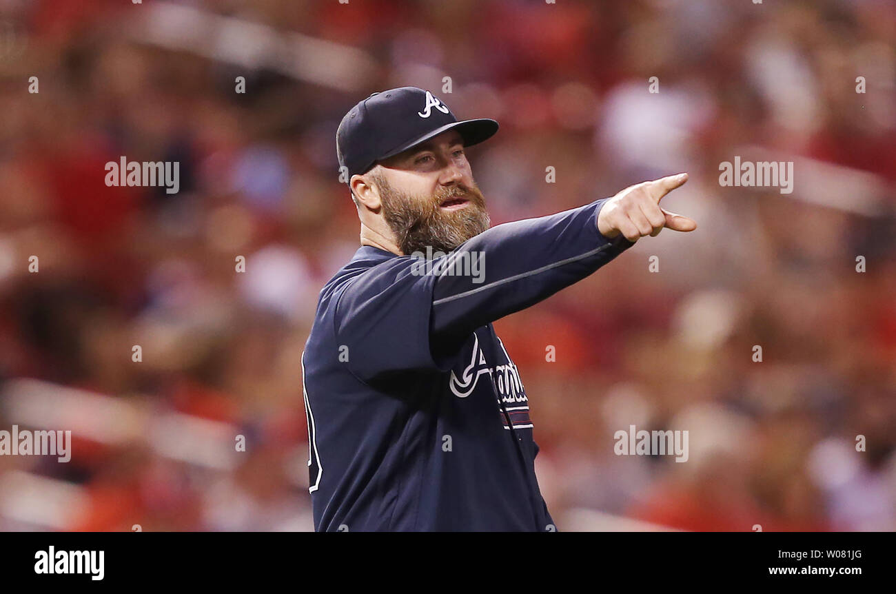 Atlanta Braves pitcher Jason Motte points to first baseman Freddie ...