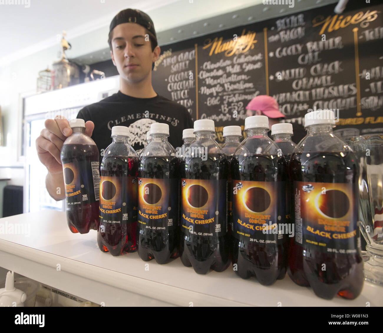 Soda jerk Harry Critchfield-Jain refreshes a display of Darkest Hour ...