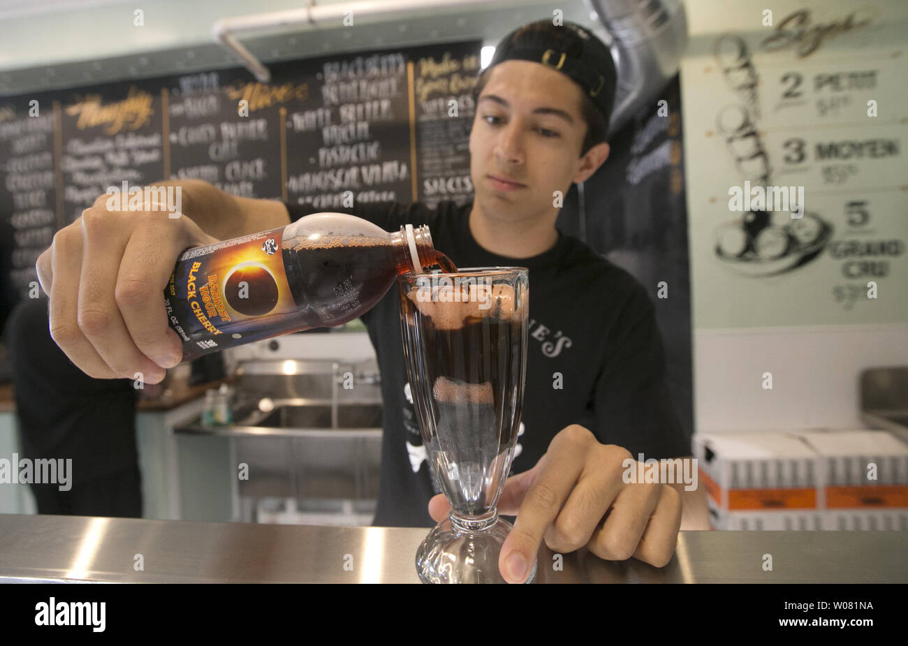 Soda jerk Harry Critchfield-Jain pours the Darkest Hour Black Cherry ...