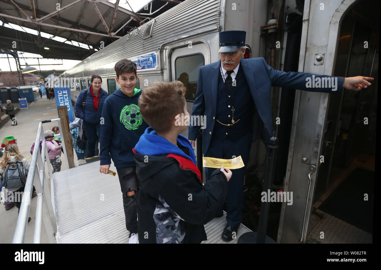 A conductor directs children for the first trip of the season of the ...