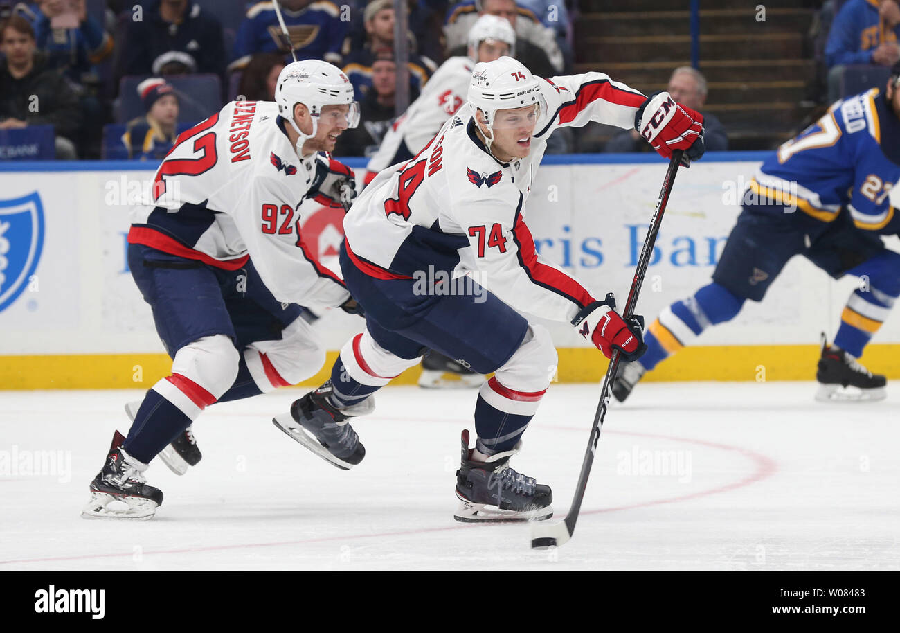 Washington Capitals John Carlson passes the puck out of his zone in the ...