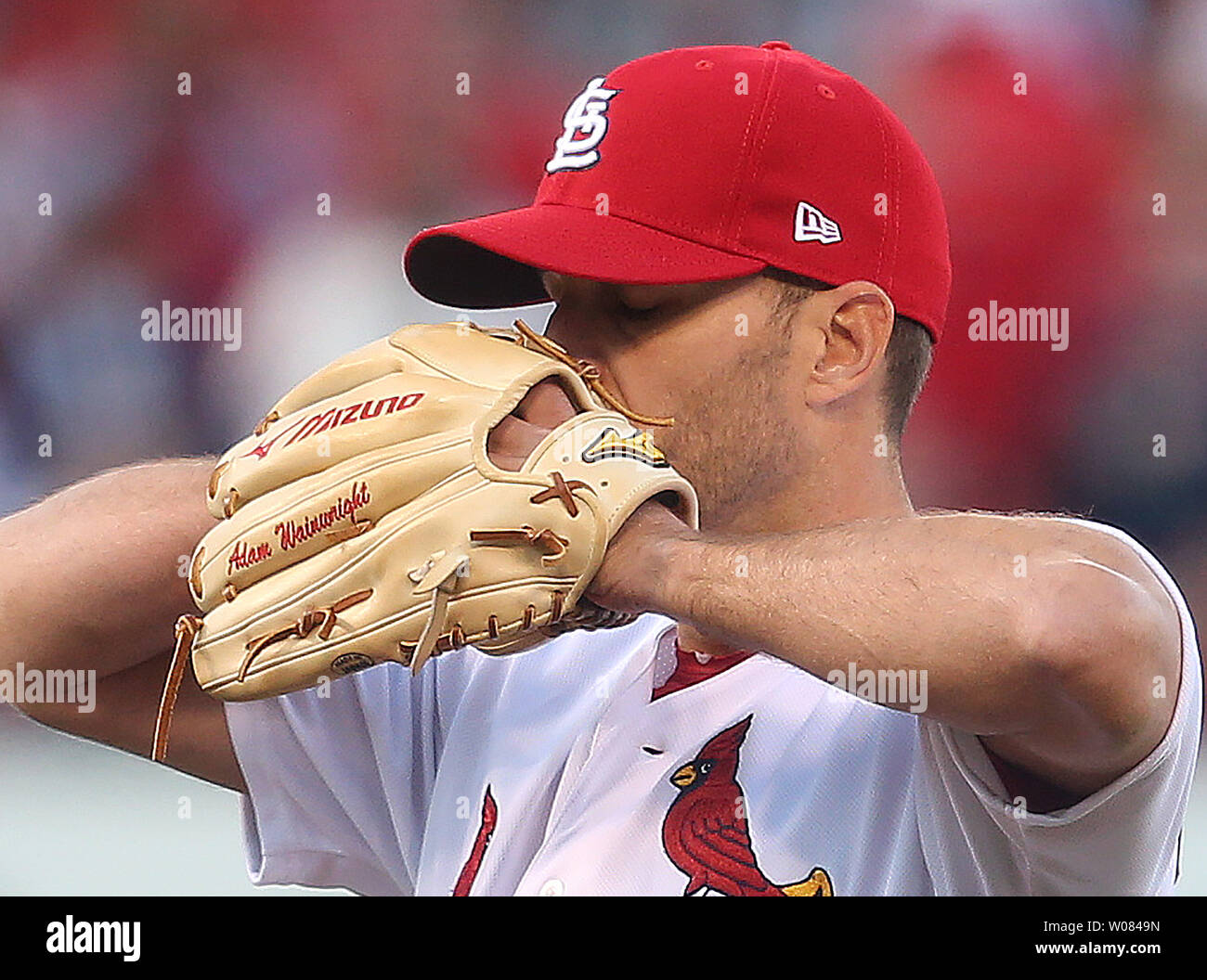St. Louis Cardinals starting pitcher Adam Wainwright meditates a moment ...