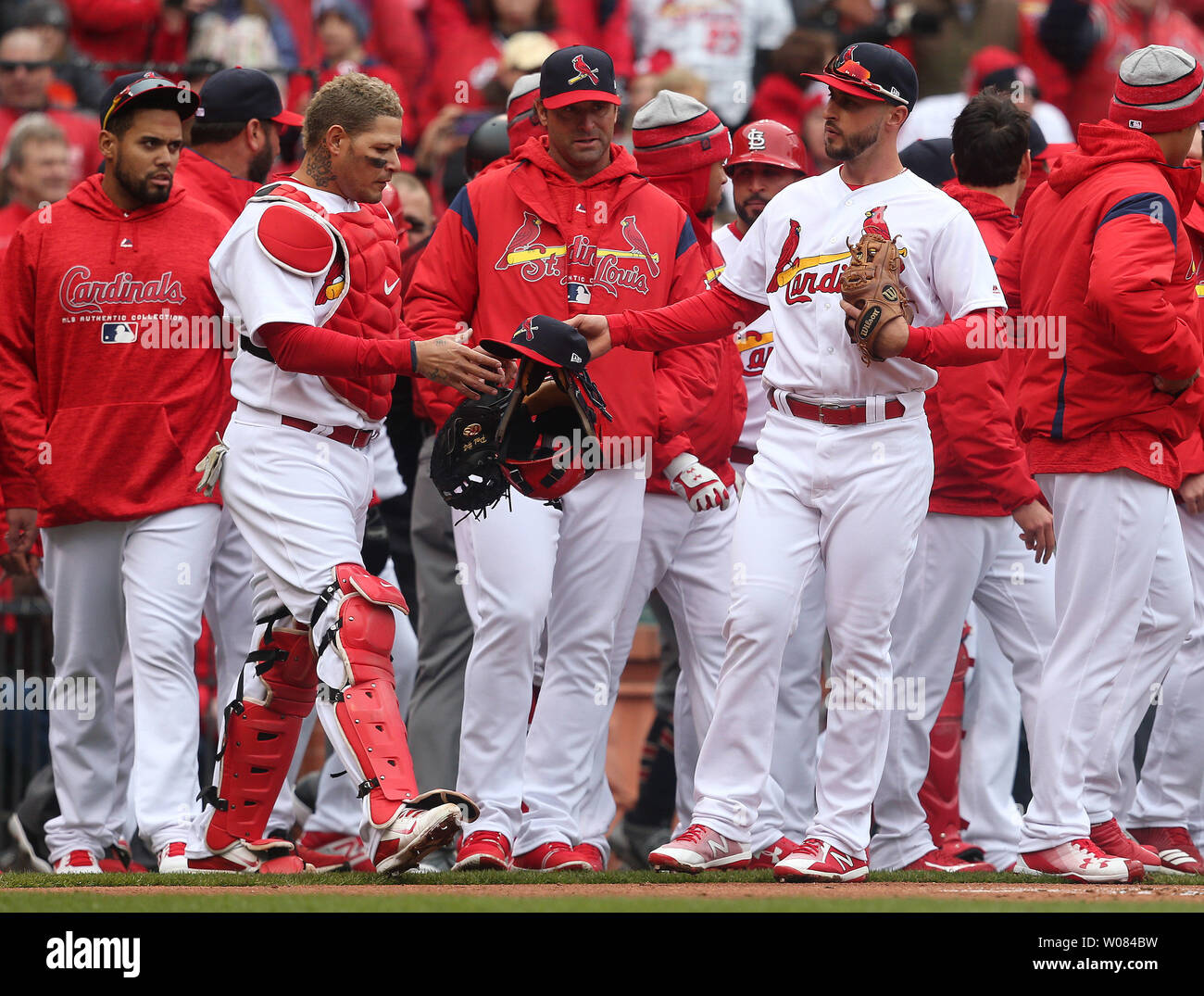 St. Louis Cardinals starting pitcher Luke Weaver hands catcher Yadier ...