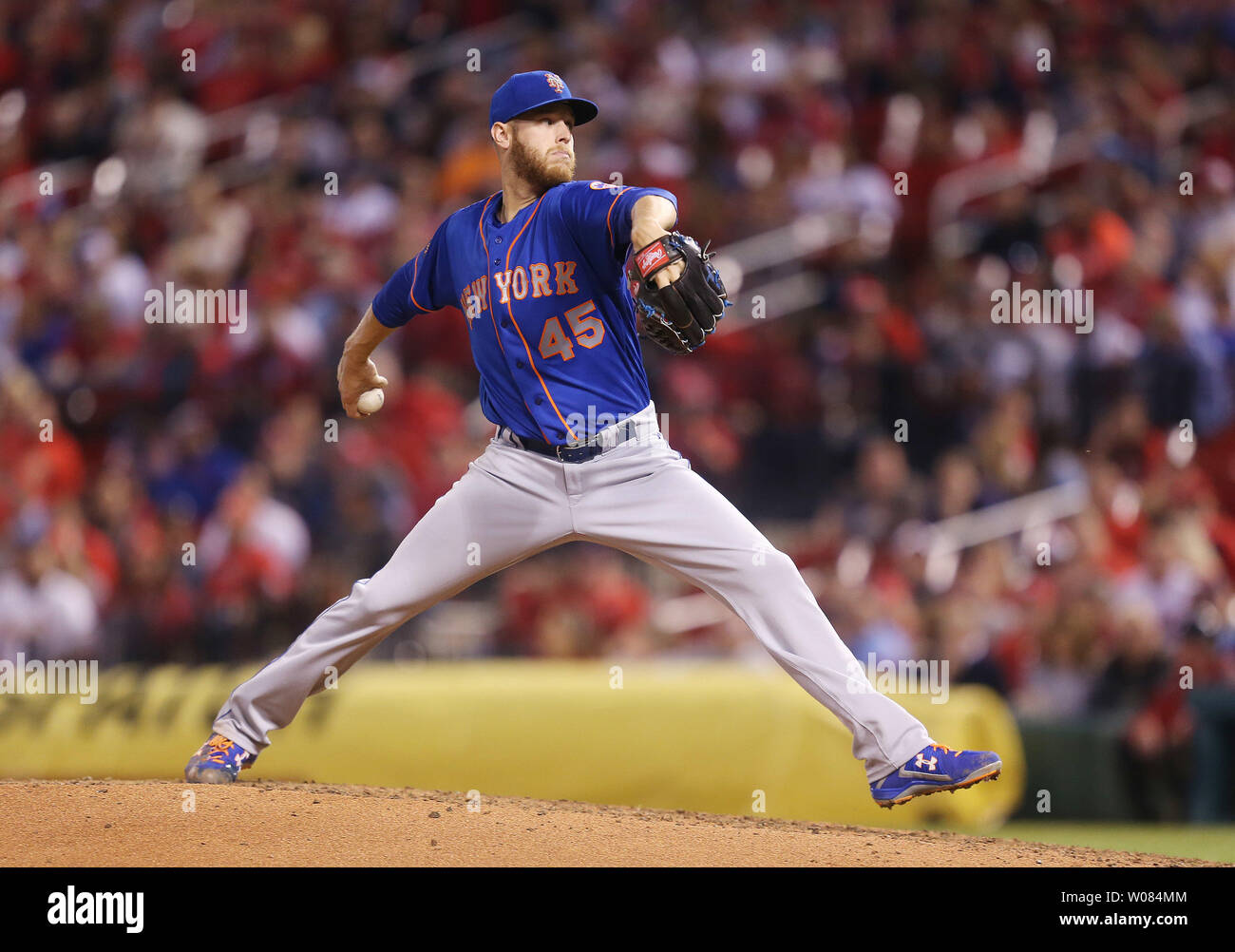 New York Mets starting pitcher Zack Wheeler delivers a pitch to the St ...