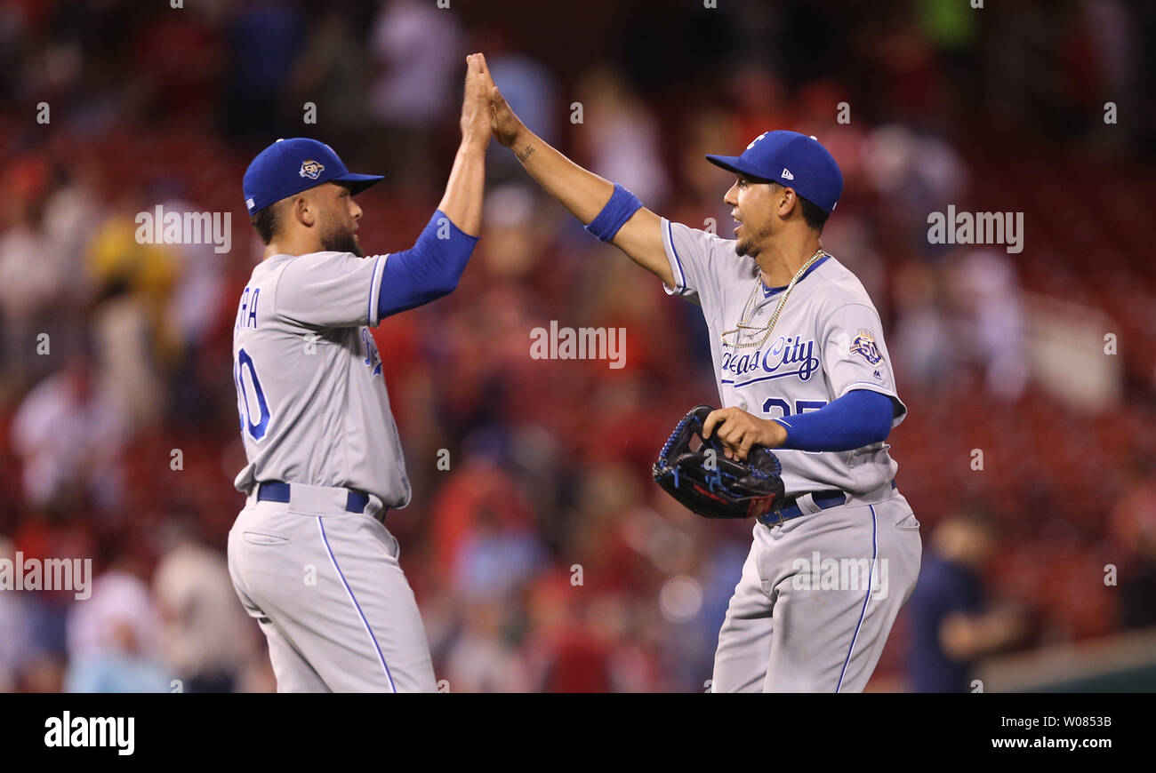 Kansas City Royals Jon Jay and pitcher Kelvin Herrera (L) slap hands ...